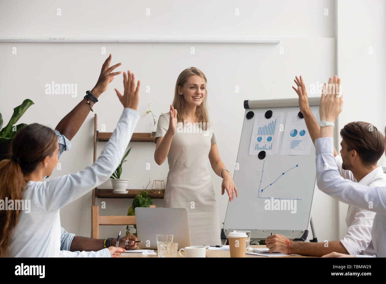 Caucasian female executive manager presenting new project, colleagues ...