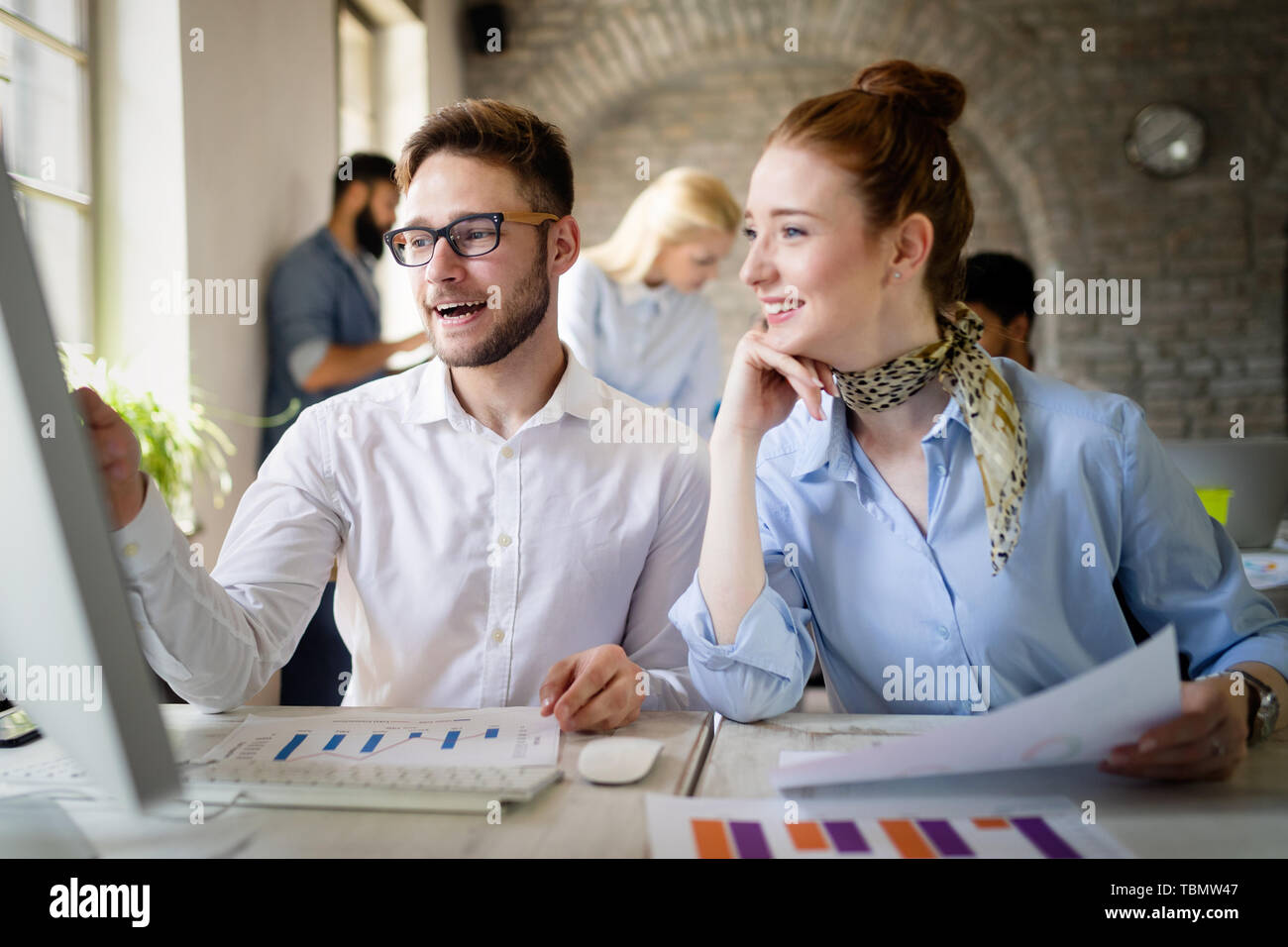 Happy creative team in office. Business, startup, design, people and ...