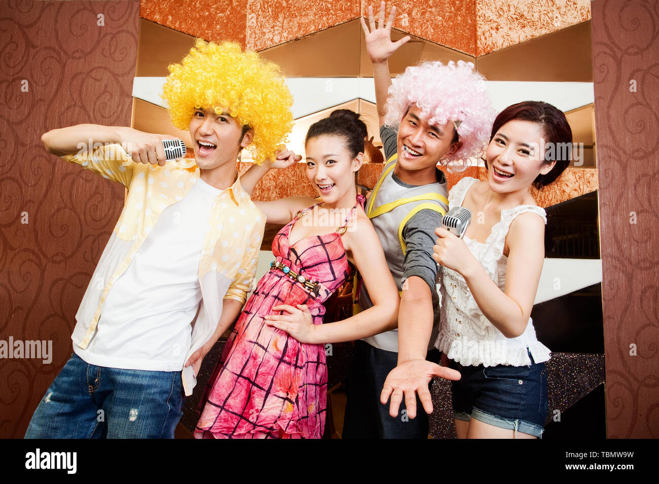 Four friends, party, party Stock Photo - Alamy