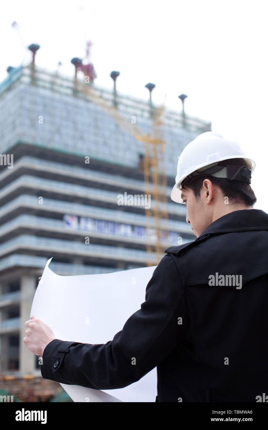 Staff at the construction site Stock Photo - Alamy