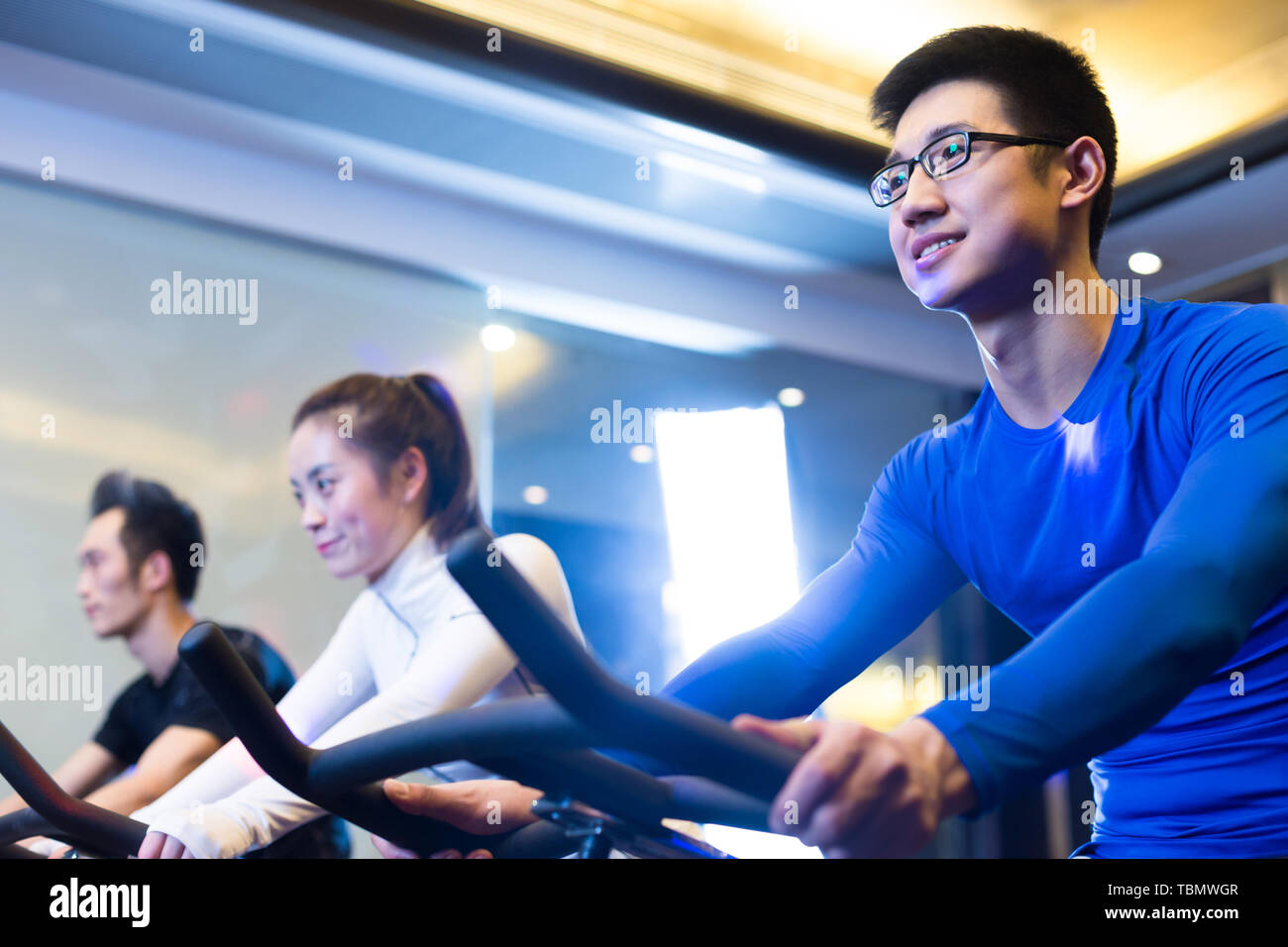 young asian people working out in modern gym Stock Photo - Alamy