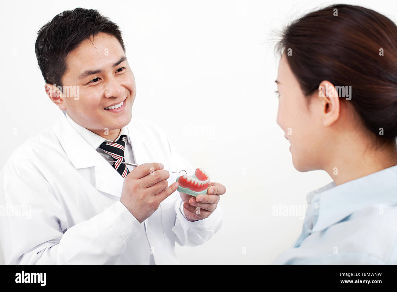 Oral examination in the clinic Stock Photo - Alamy