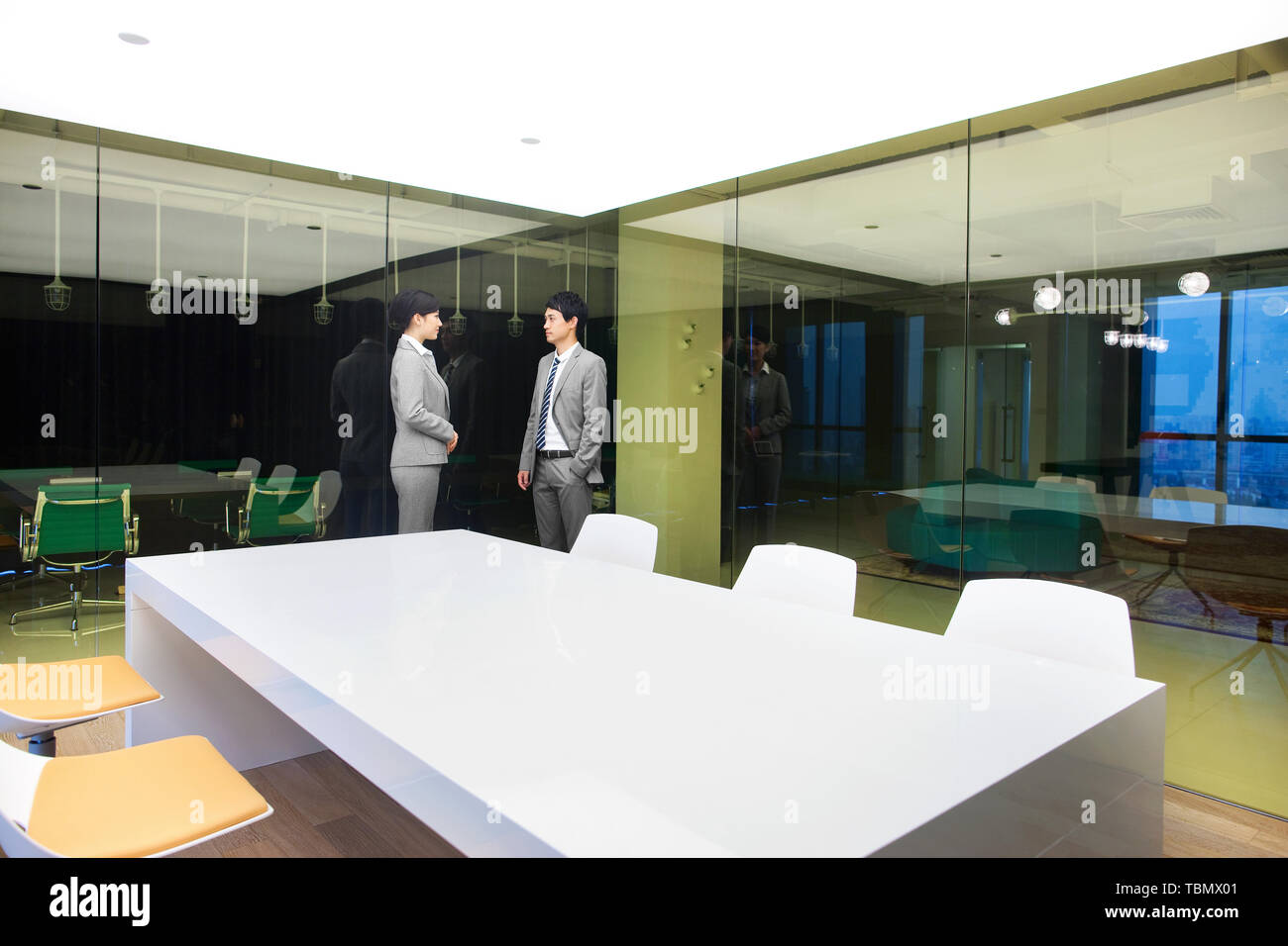 Communication between two business people at work Stock Photo - Alamy