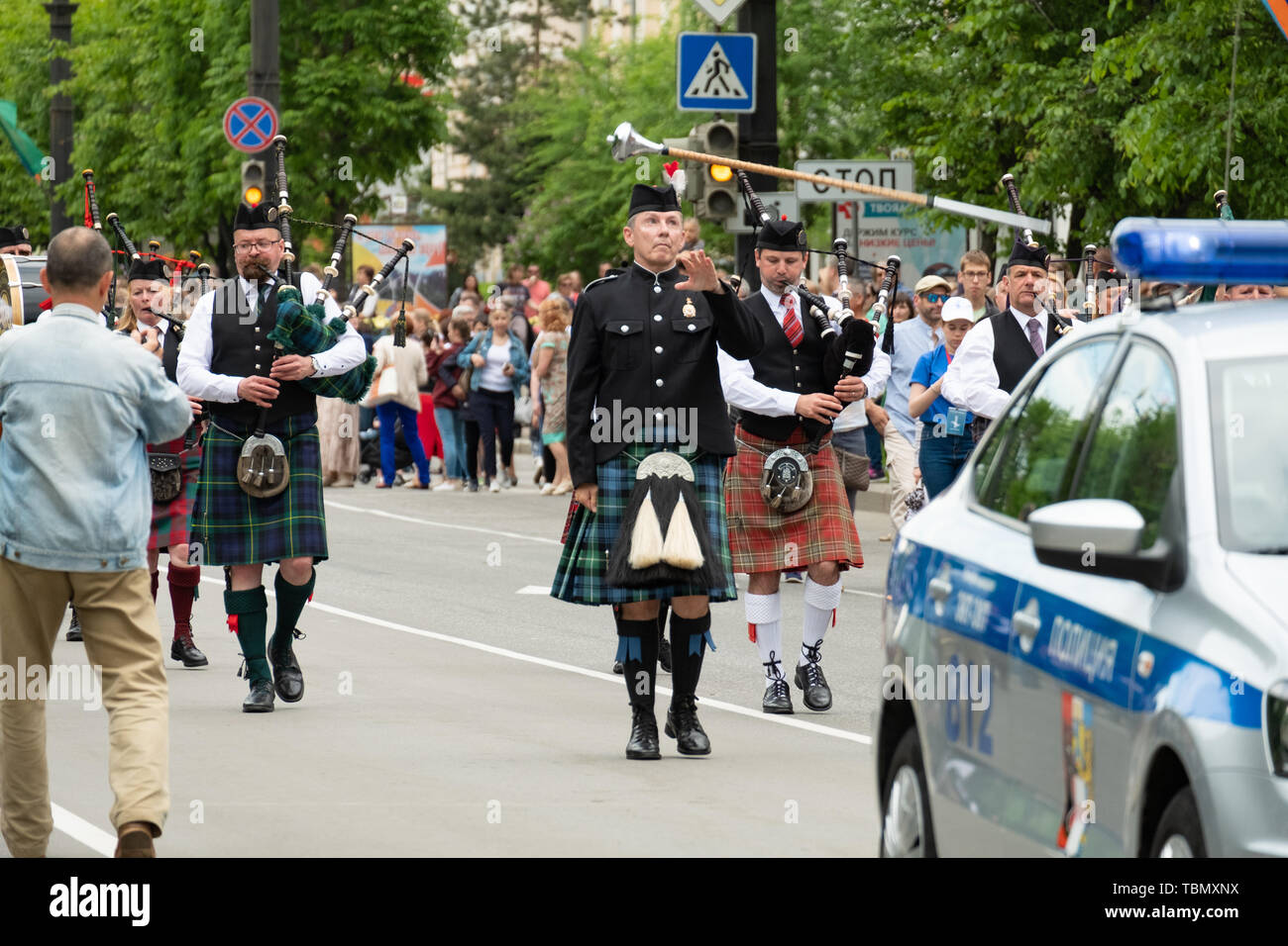 Military music bands marching through the empty streets of the city of ...