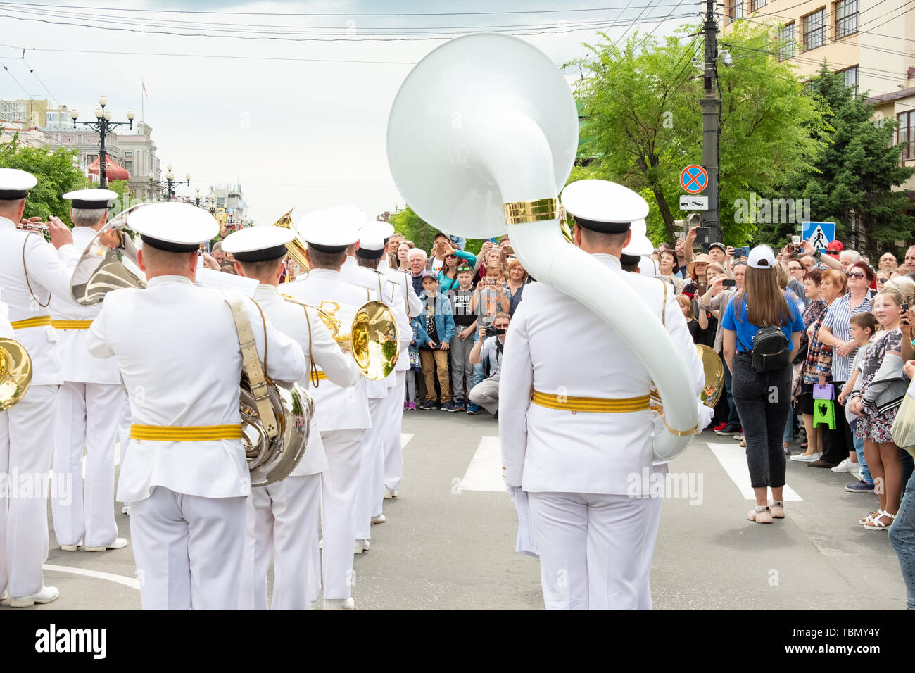 Military music bands marching through the empty streets of the city of ...