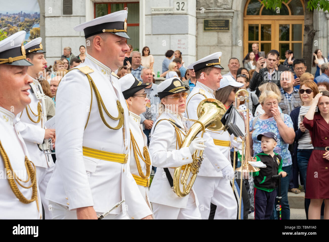 Military music bands marching through the empty streets of the city of ...