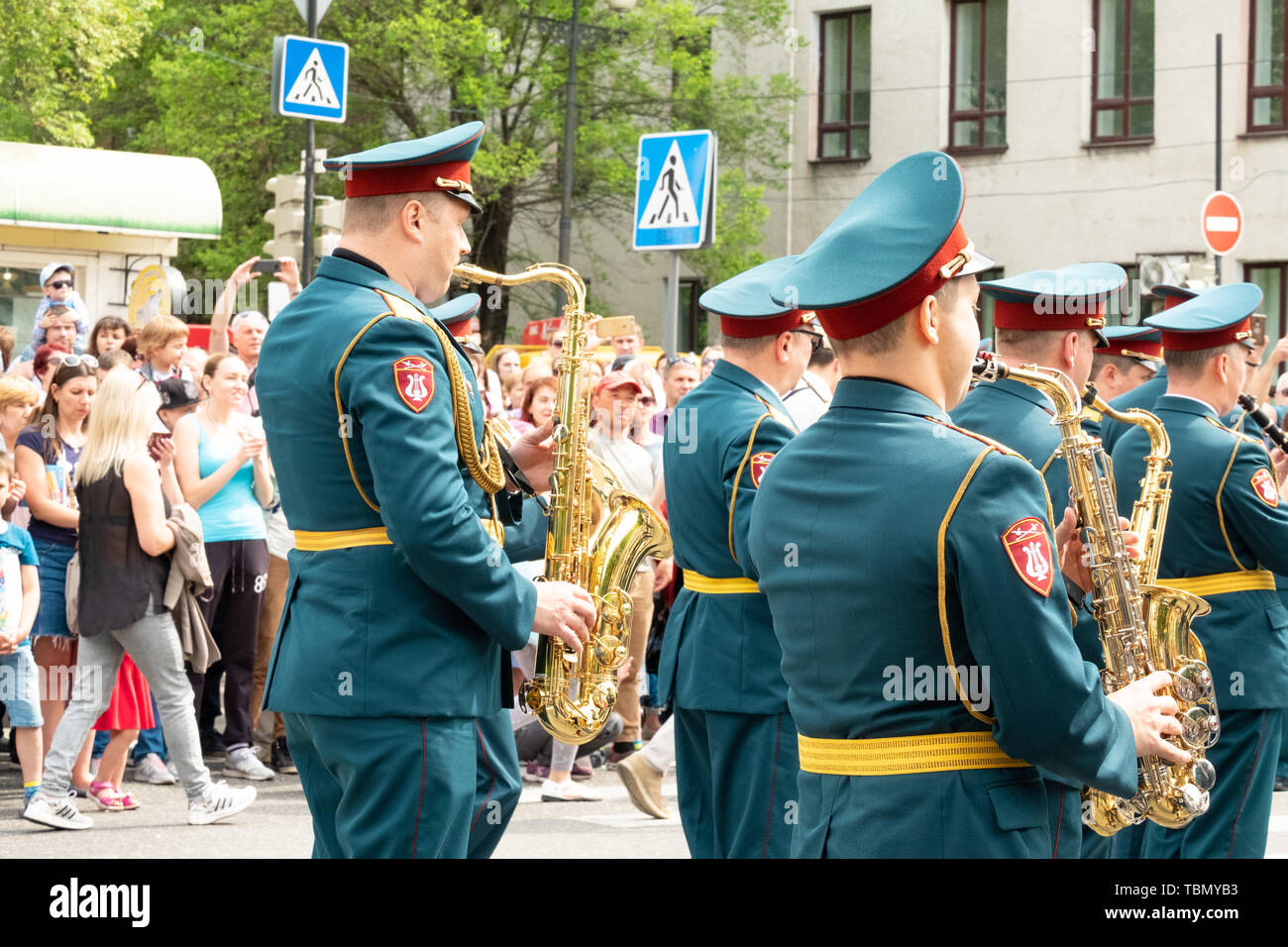Military music bands marching through the empty streets of the city of ...