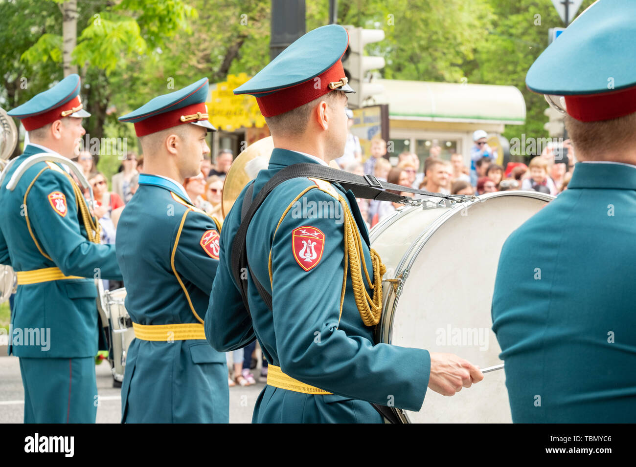 Military music bands marching through the empty streets of the city of ...