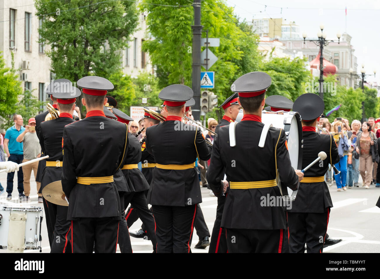 Military music bands marching through the empty streets of the city of ...
