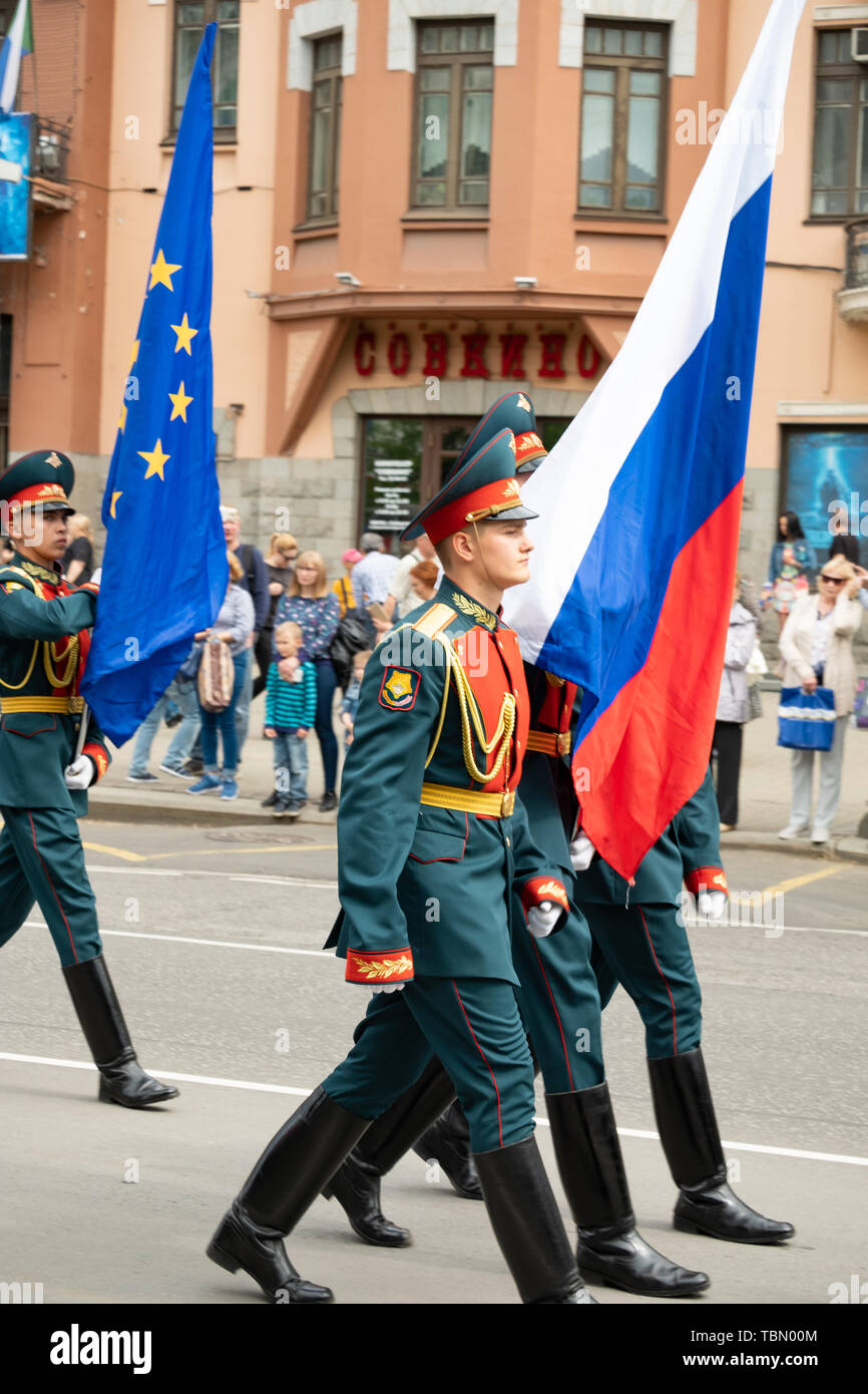 Military music bands marching through the empty streets of the city of ...