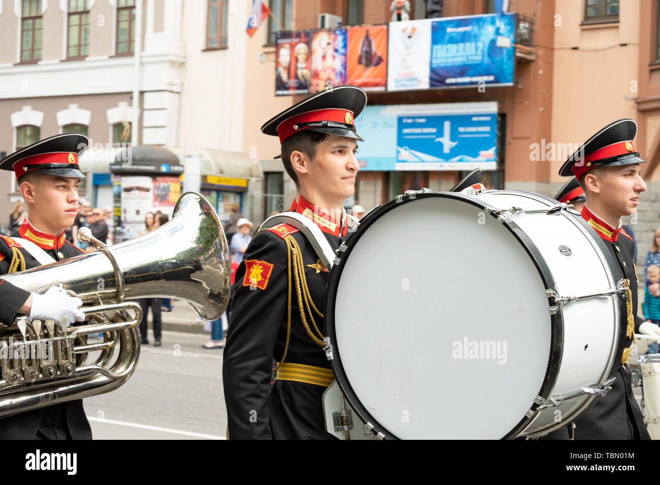 Military music bands marching through the empty streets of the city of ...