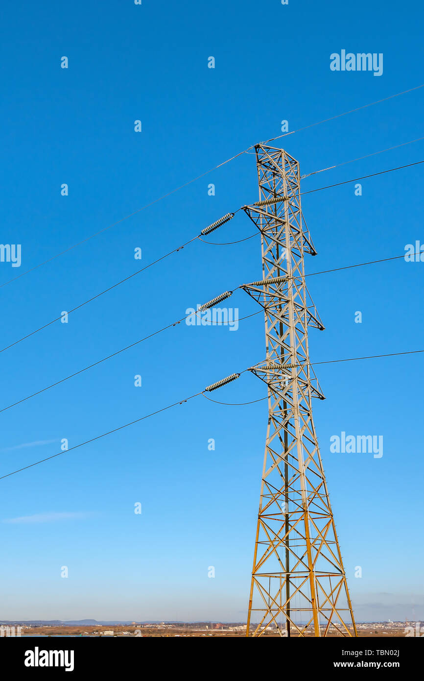 Huge Transmission tower in a beautiful blue sky day Stock Photo - Alamy