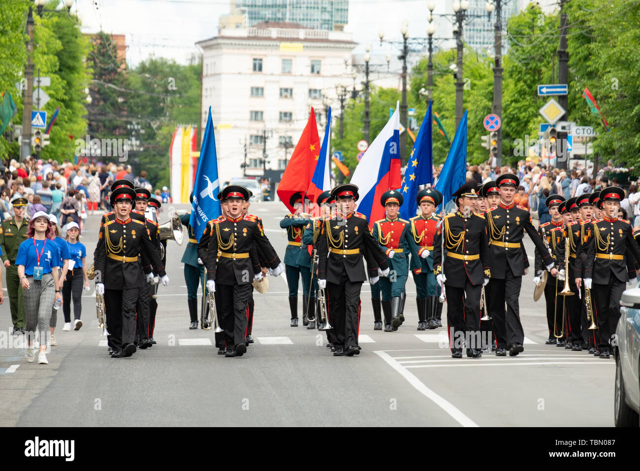 Military music bands marching through the empty streets of the city of ...