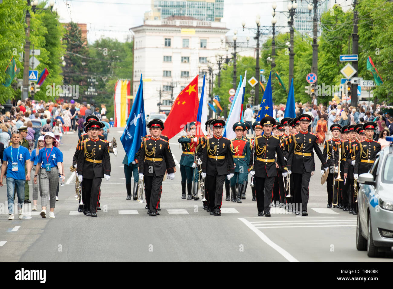 Military music bands marching through the empty streets of the city of ...