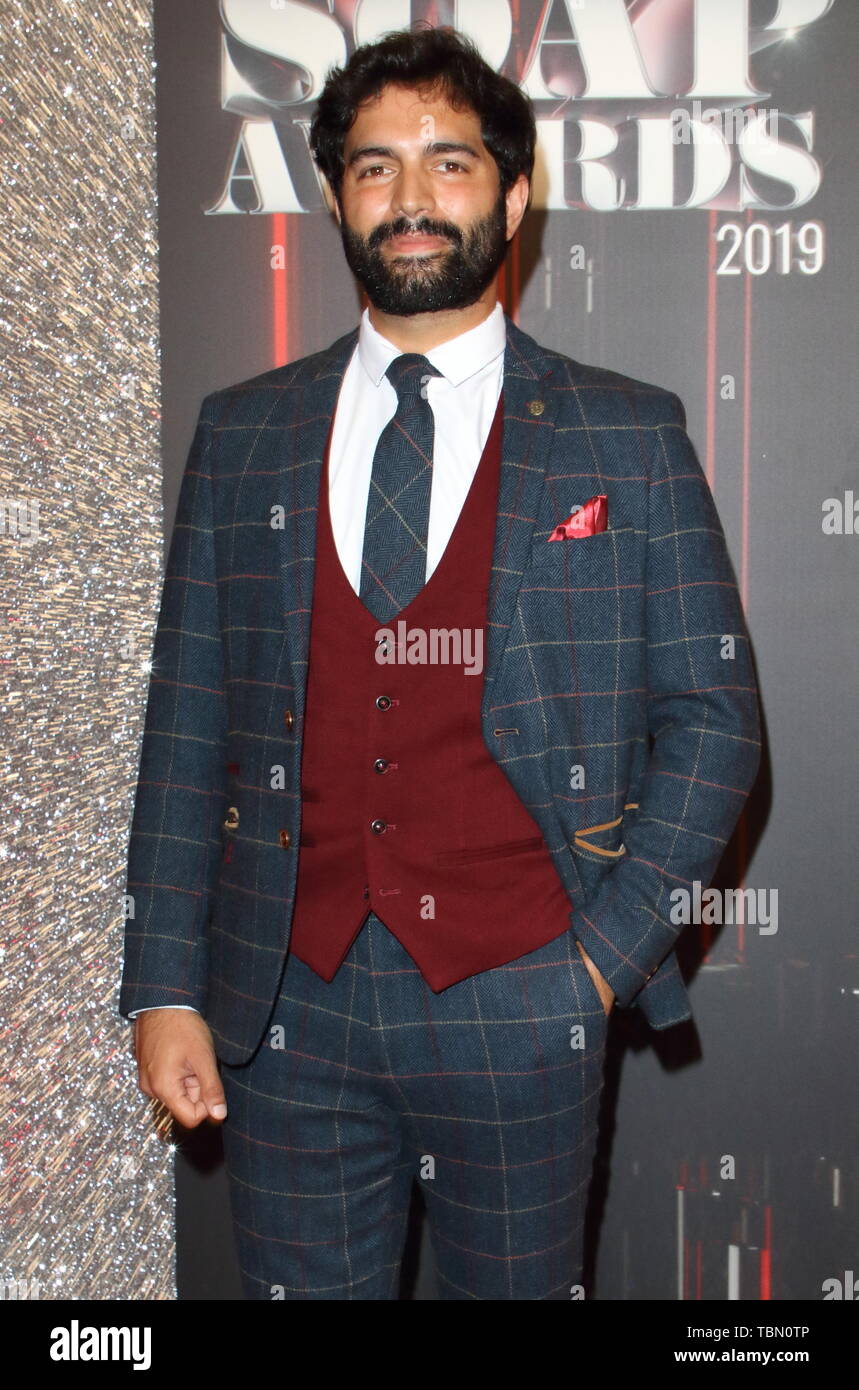 Charlie De Melo arrives on the red carpet during The British Soap ...