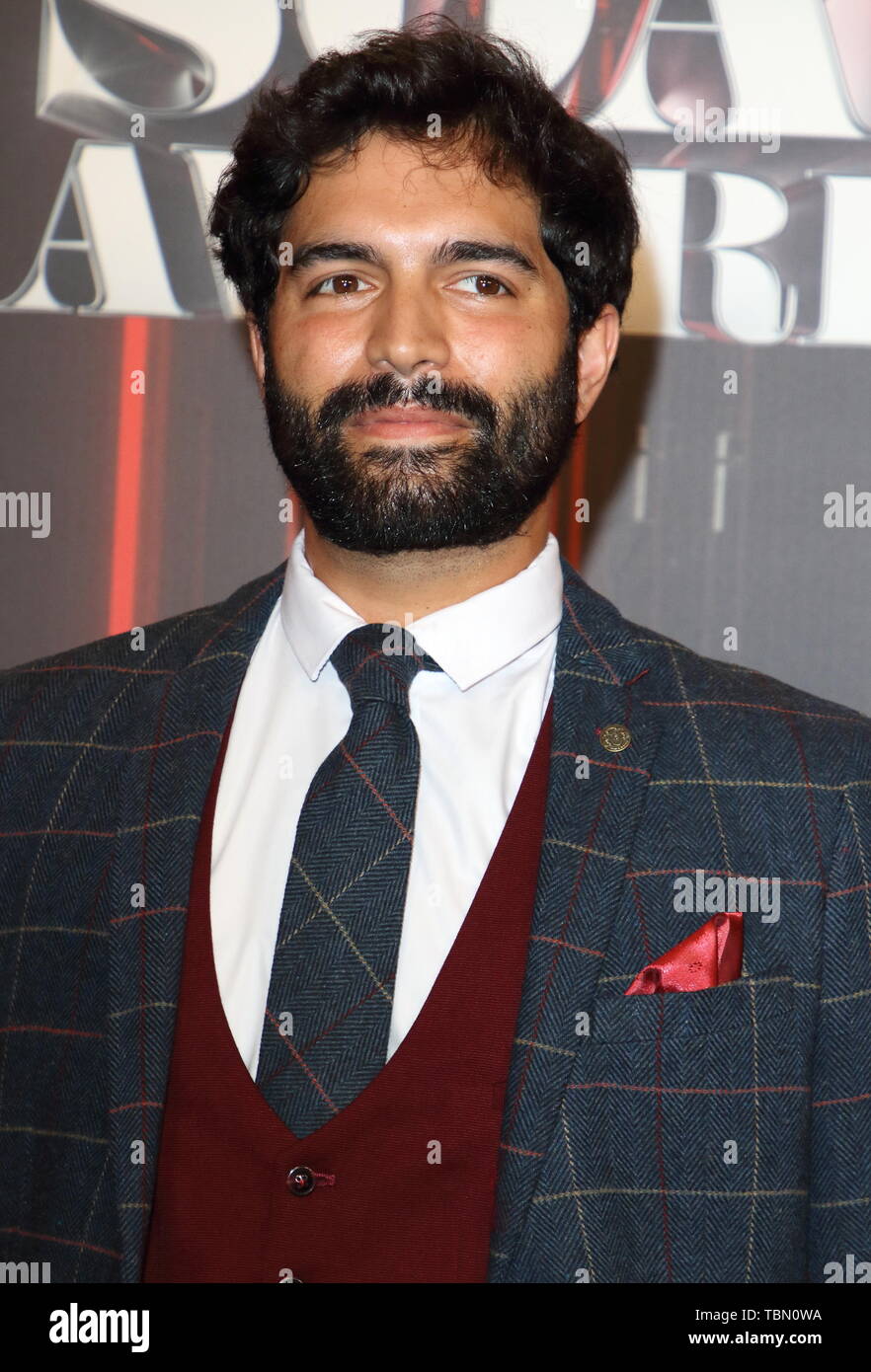 Charlie De Melo arrives on the red carpet during The British Soap ...