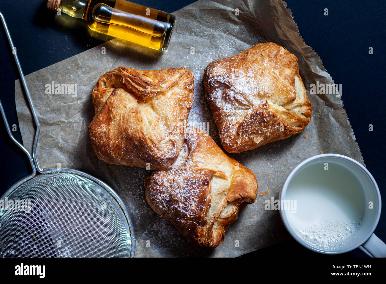 Freshly homebaked cheese-cloth with cottage-cheese on rustic background ...