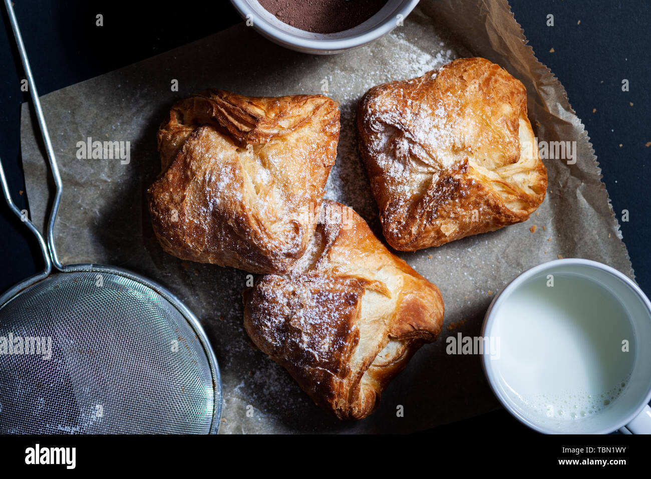 Freshly homebaked cheese-cloth with cottage-cheese on rustic background ...