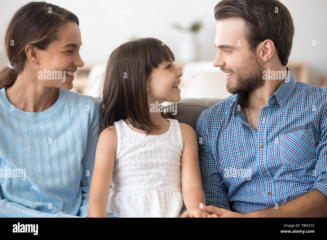 Parents talking daughter hi-res stock photography and images - Alamy