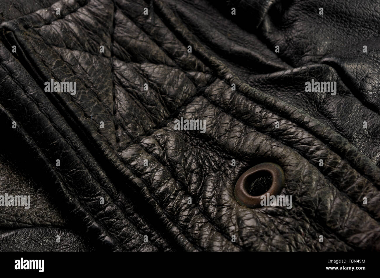 Old vintage genuine soft black leather texture background, top layer ...
