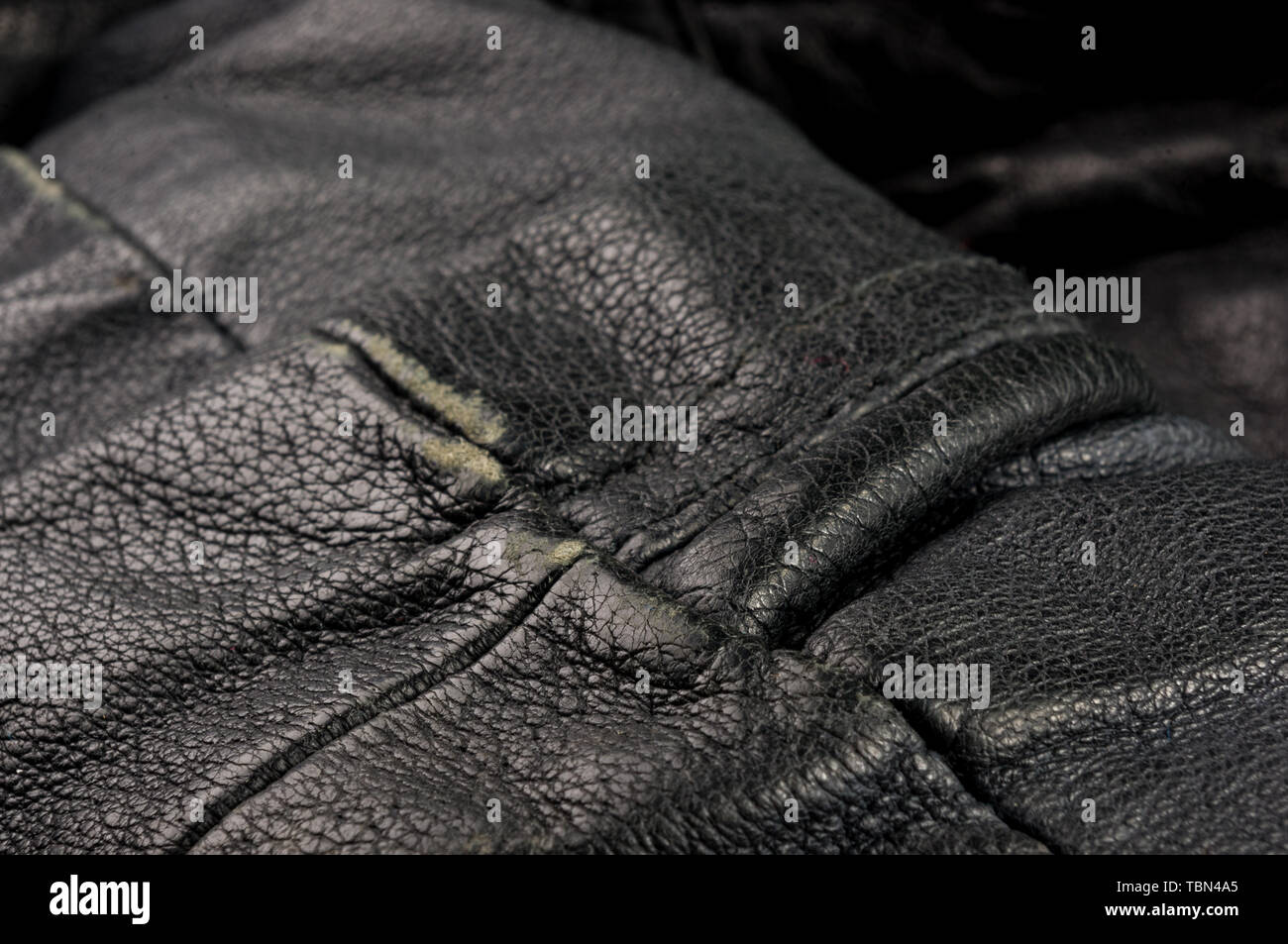 Old vintage genuine soft black leather texture background, top layer ...