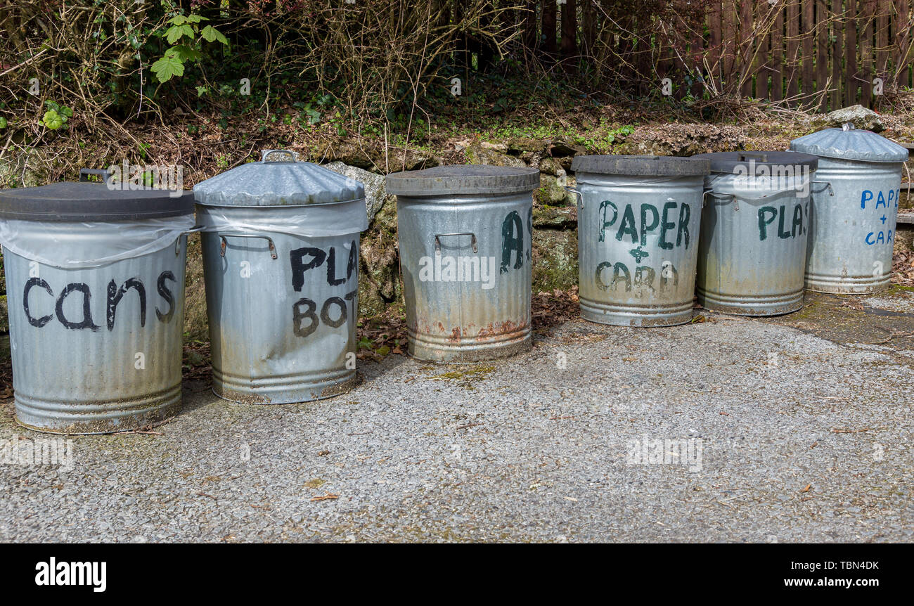 Metal outdoor recycling bins labelled for segregated rubbish Stock ...
