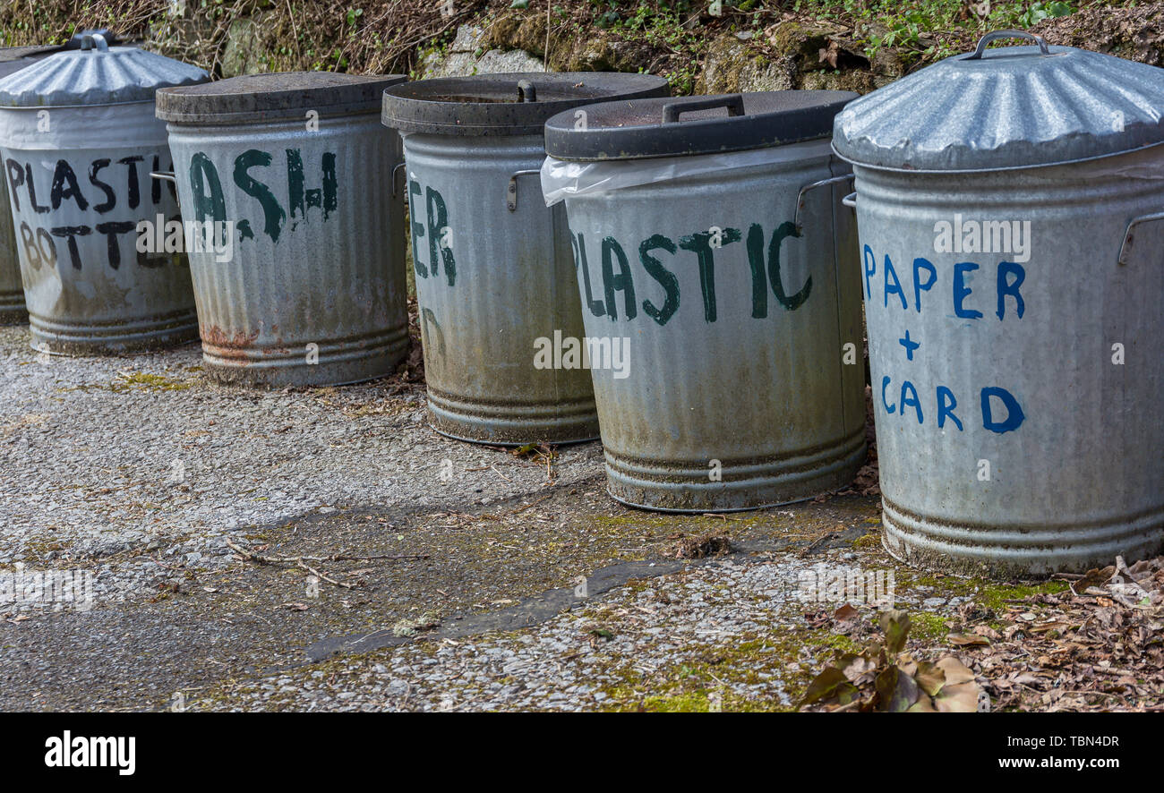Metal outdoor recycling bins labelled for segregated rubbish Stock ...