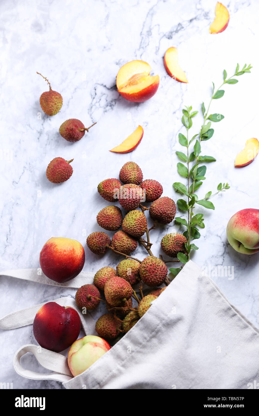 Litchi and manuscripts Stock Photo - Alamy