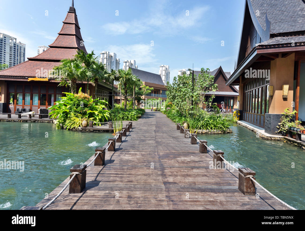 pathway to resort building Stock Photo - Alamy