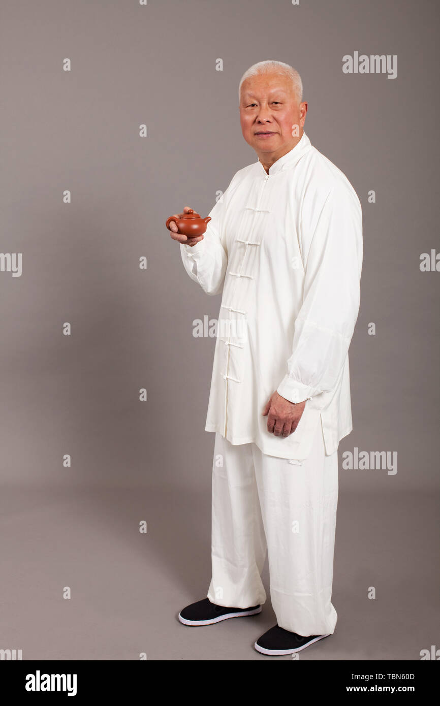 Chinese Man Traditional Clothing White Stock Photos & Chinese Man ...