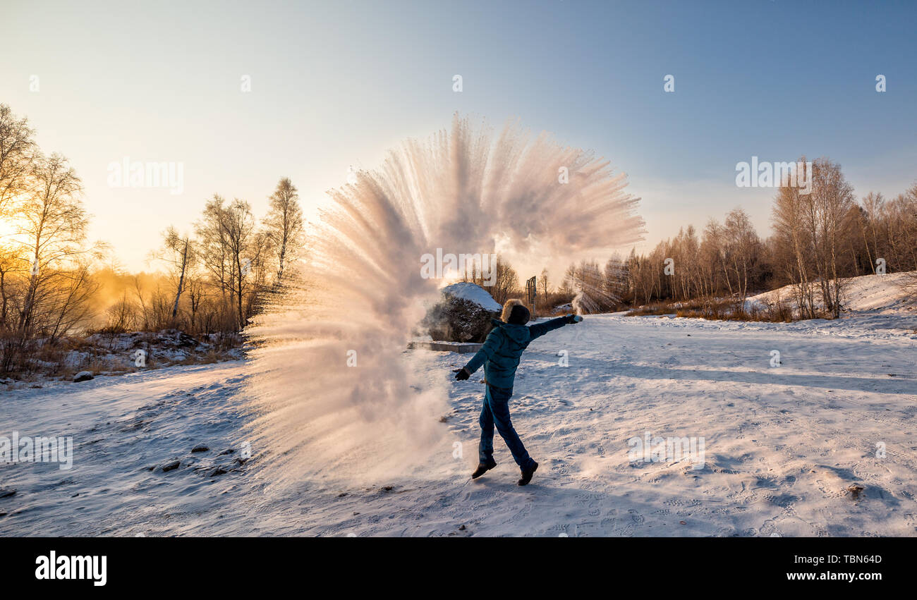 Sprinkle water into ice Stock Photo - Alamy