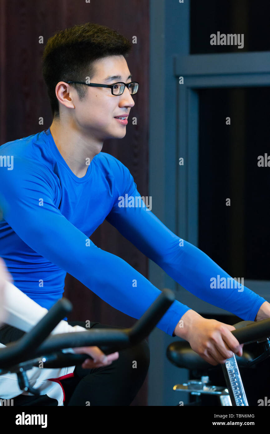 young asian people working out in modern gym Stock Photo - Alamy