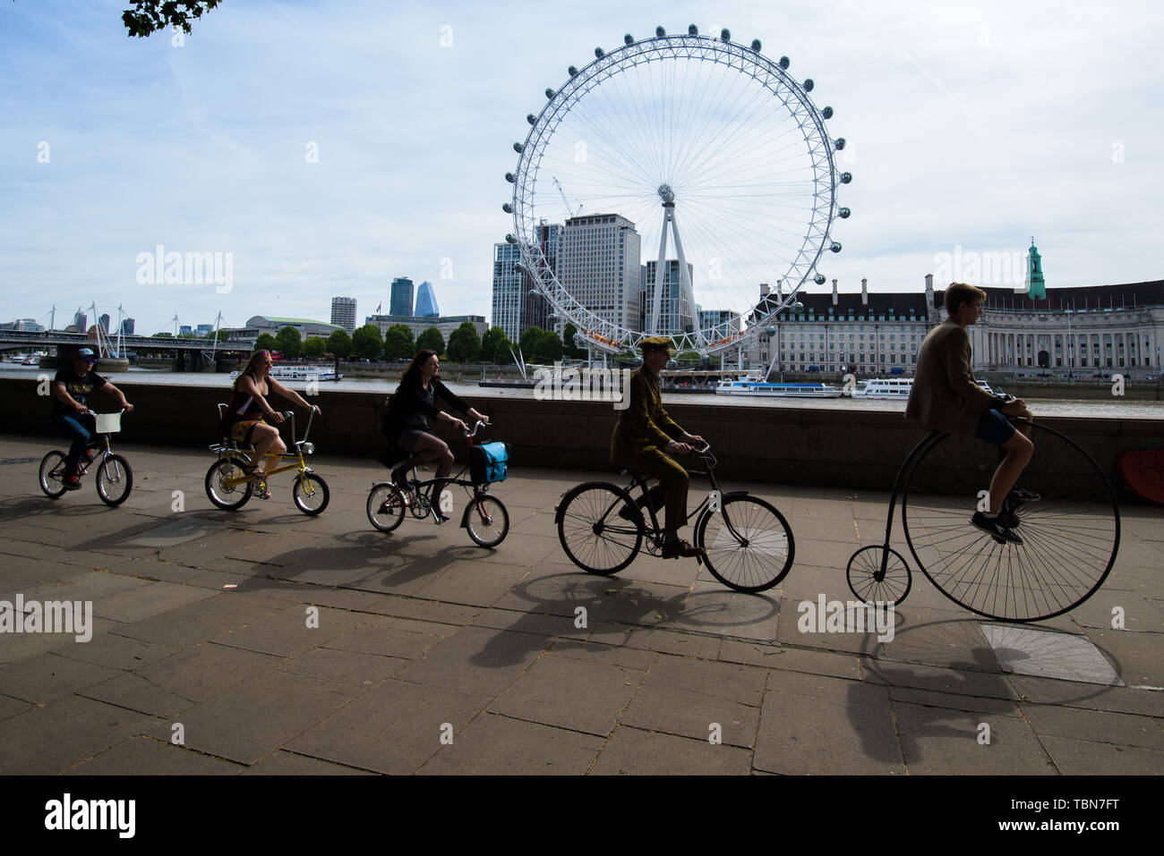 (left to right) Ross Adams rides a BMX, Christina Bengston rides a 1970 ...