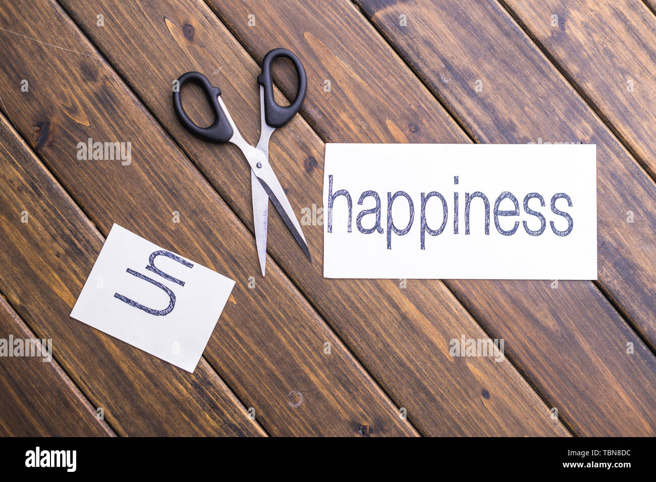 Cut paper with word Stock Photo - Alamy