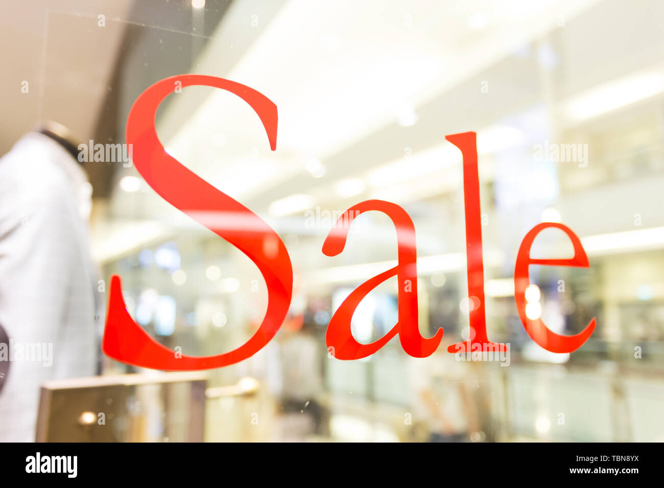 Sale sign on the shop window Stock Photo - Alamy