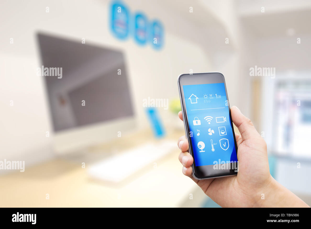 Smartphone with blurry office Stock Photo - Alamy