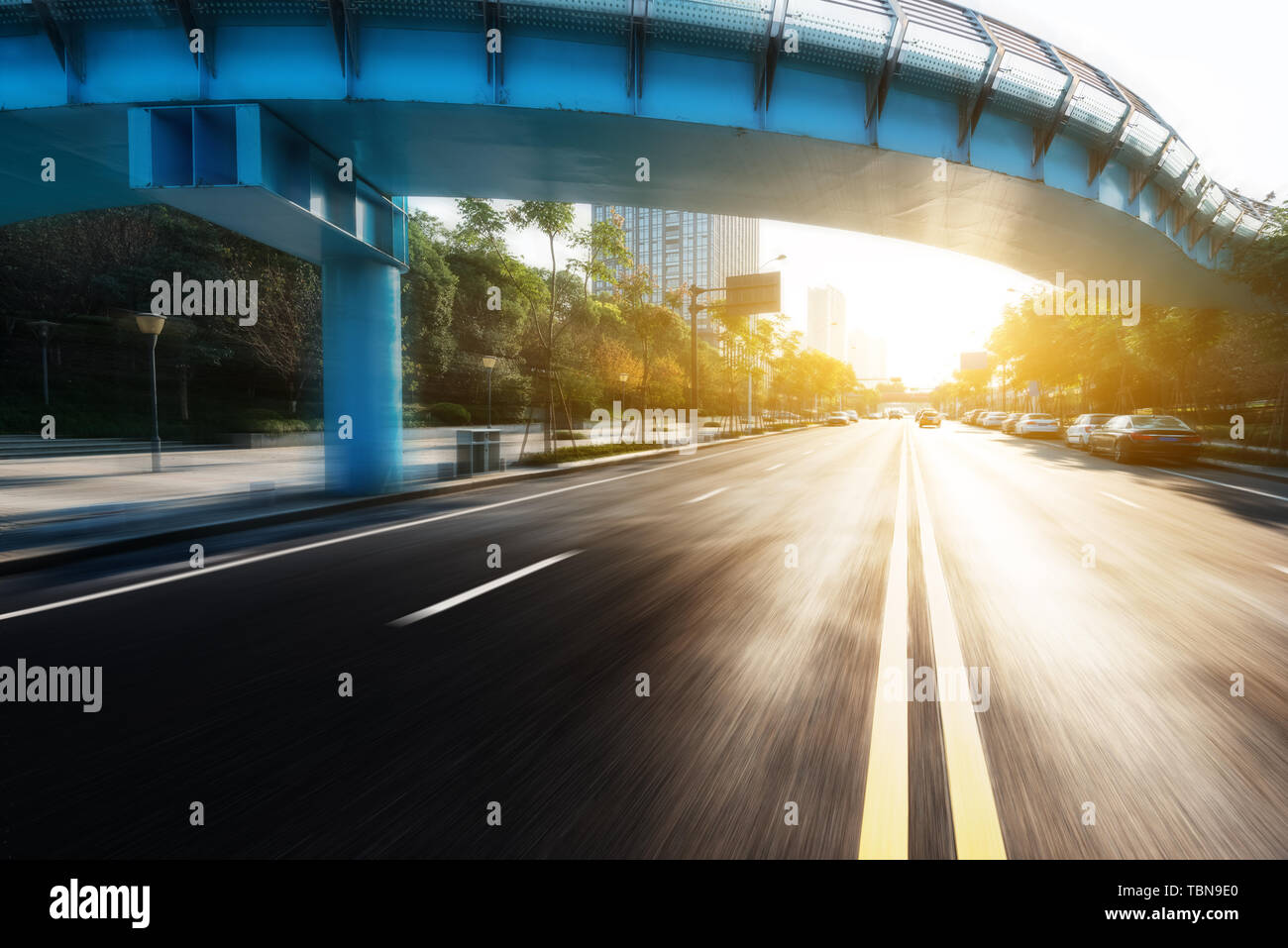 and empty road through bridge Stock Photo - Alamy