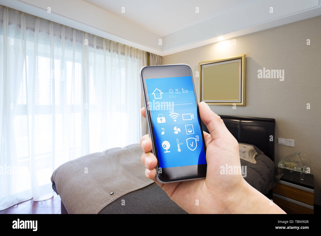 smart phone with smart home with modern bedroom Stock Photo - Alamy