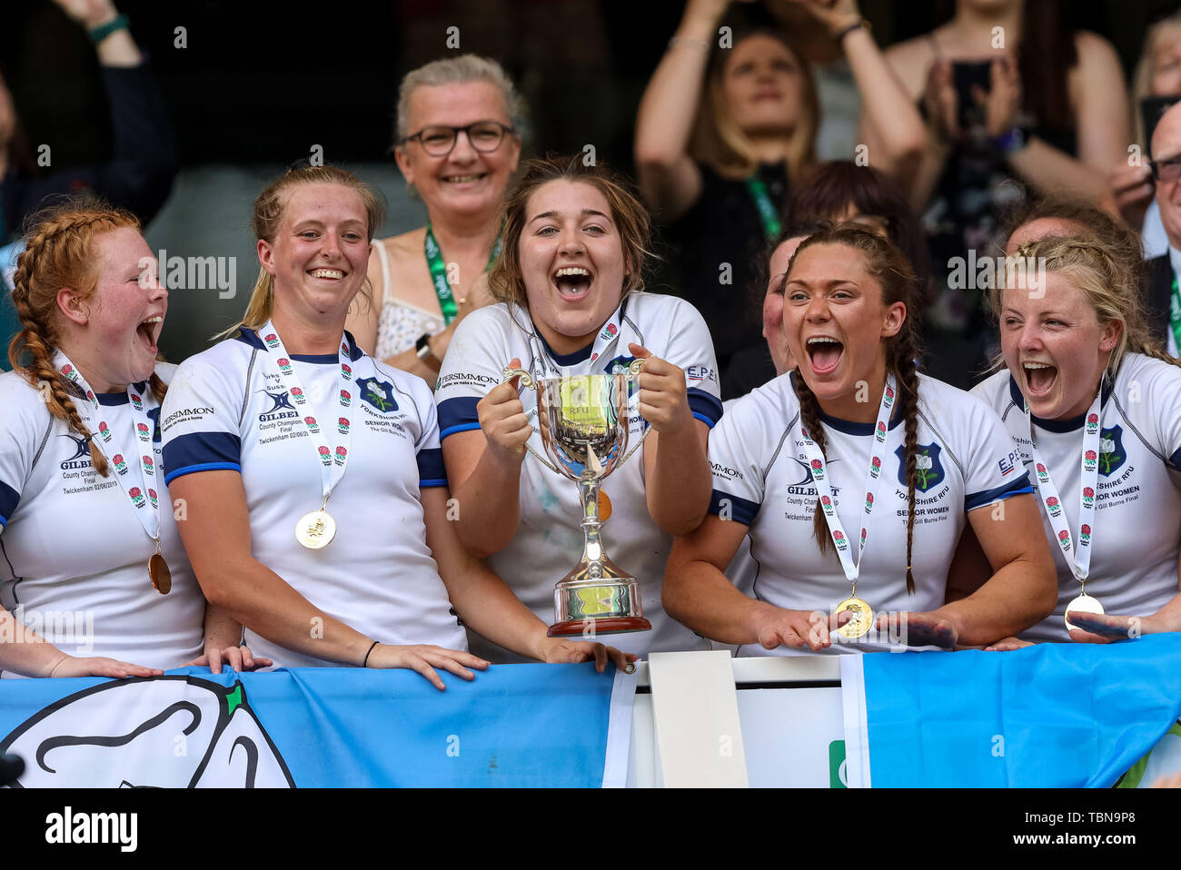 Yorkshire Captain Tilly Churm celebrates with the trophy during the ...