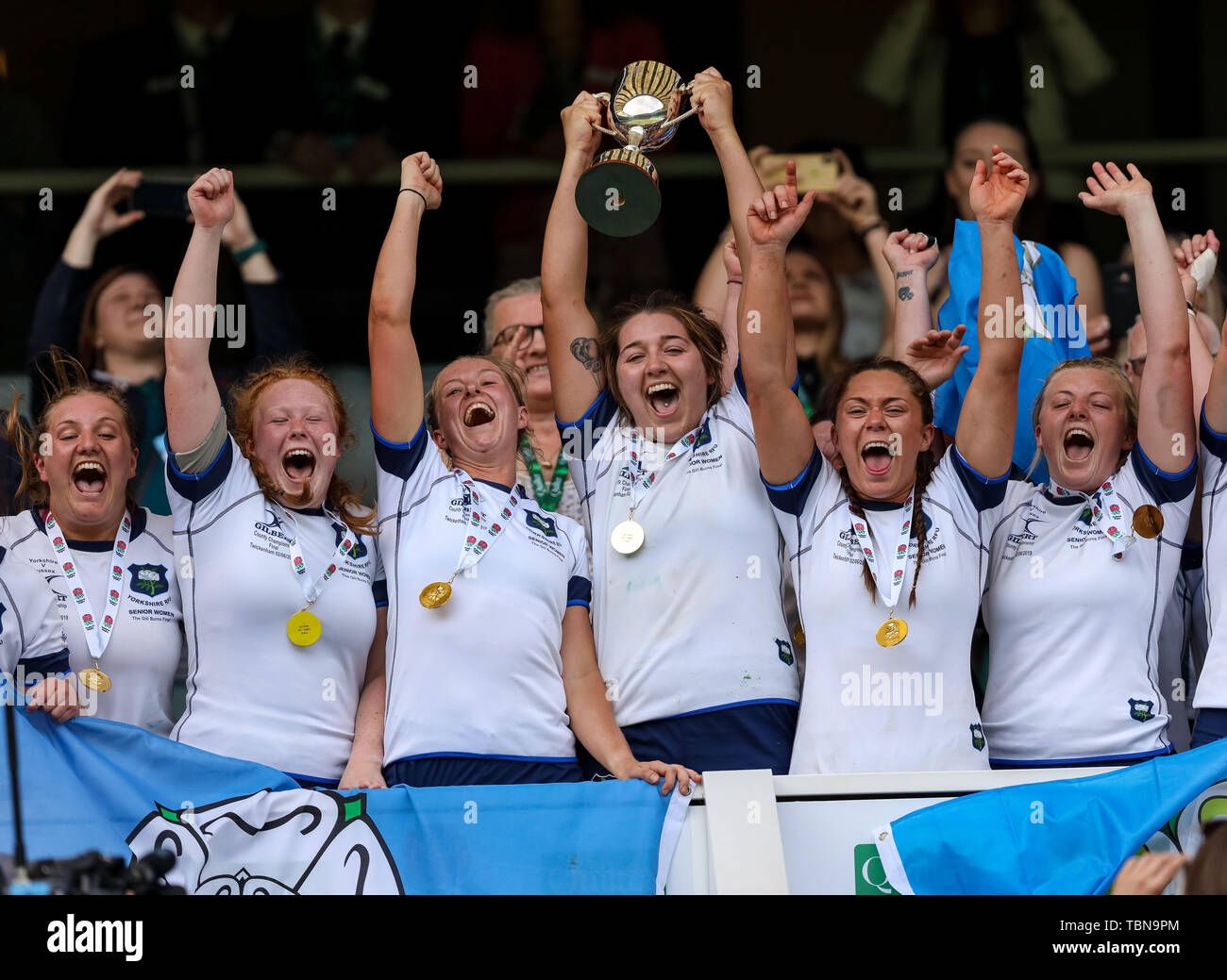 Yorkshire Captain Tilly Churm celebrates with the trophy during the ...