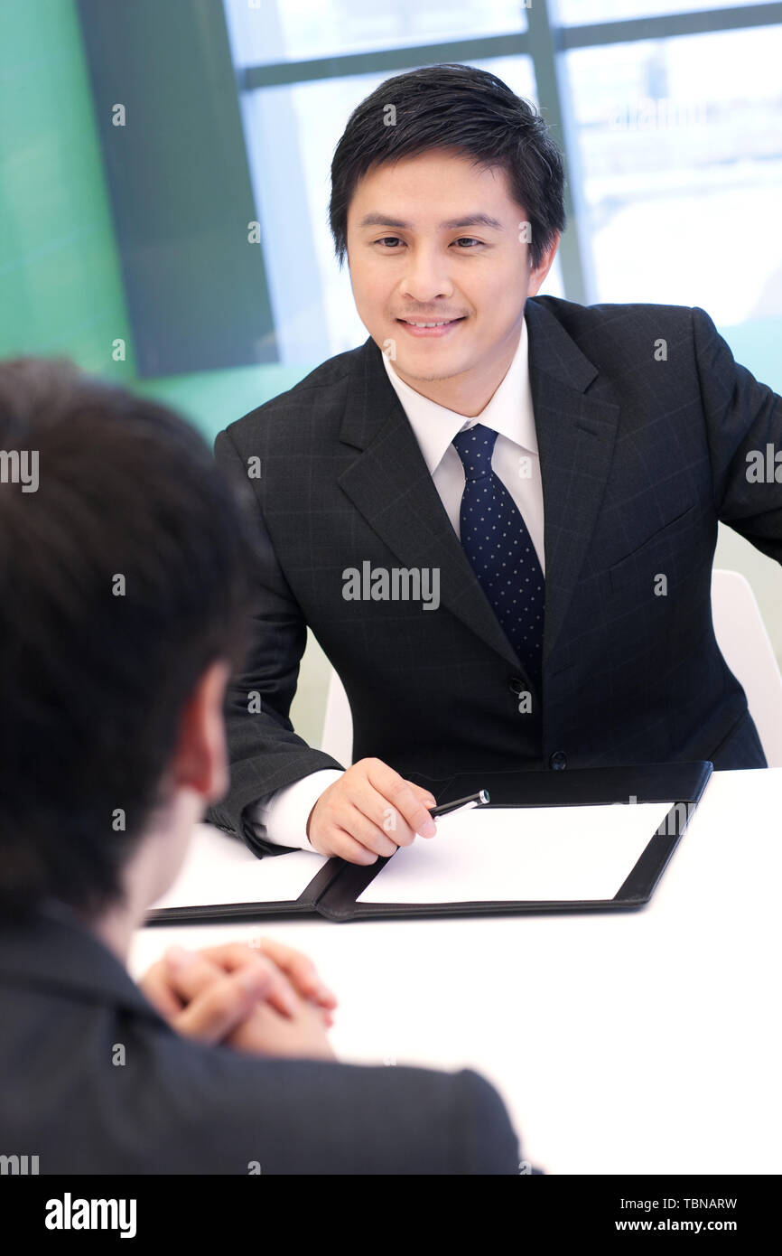 Business people interview Stock Photo - Alamy