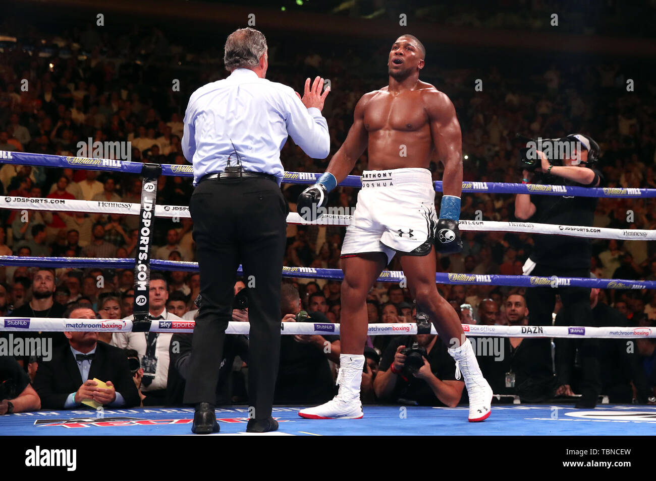 Anthony Joshua is counted down by referee Mike Griffin after being ...