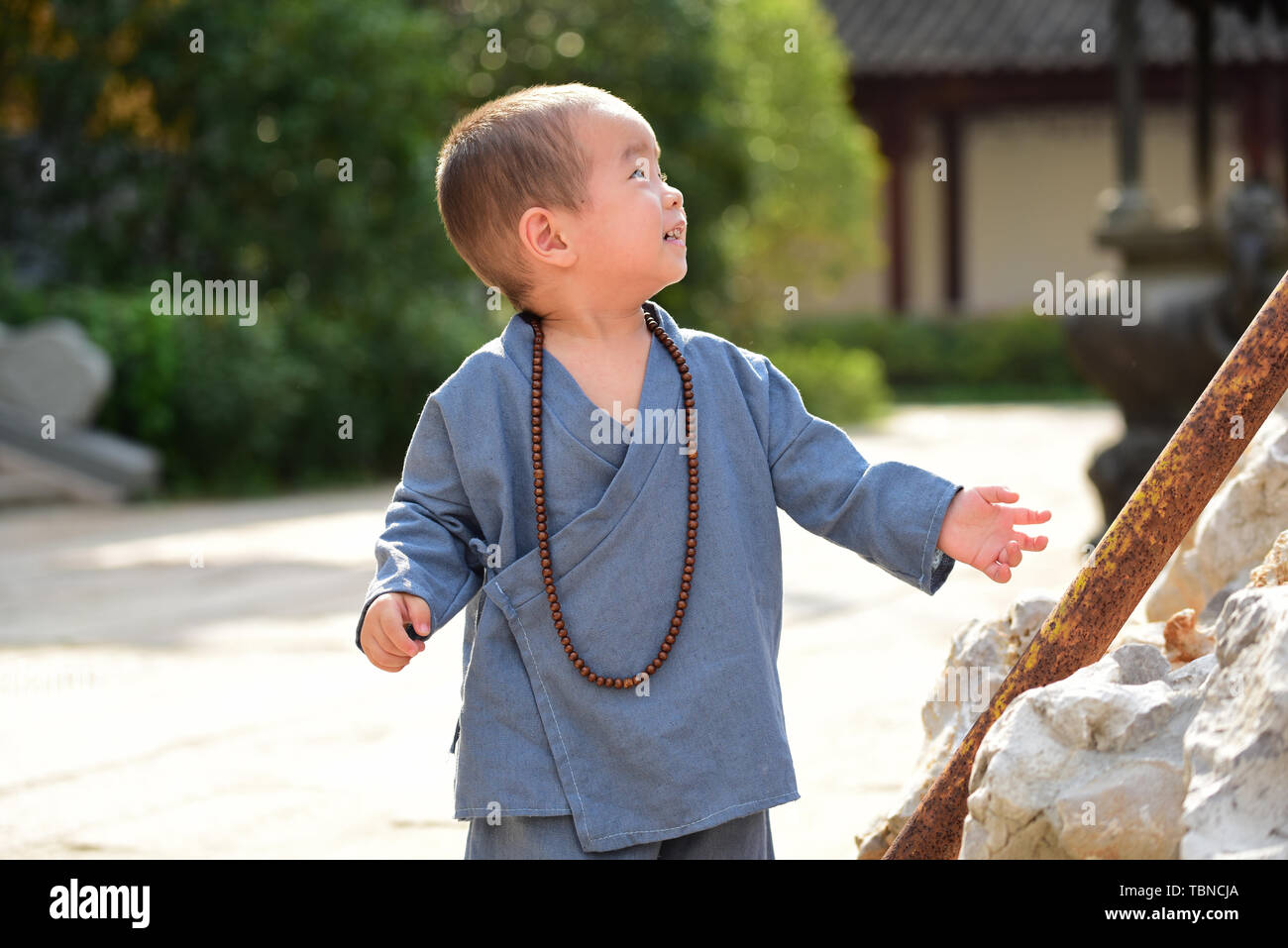 Cute little monk, children's photography Stock Photo - Alamy
