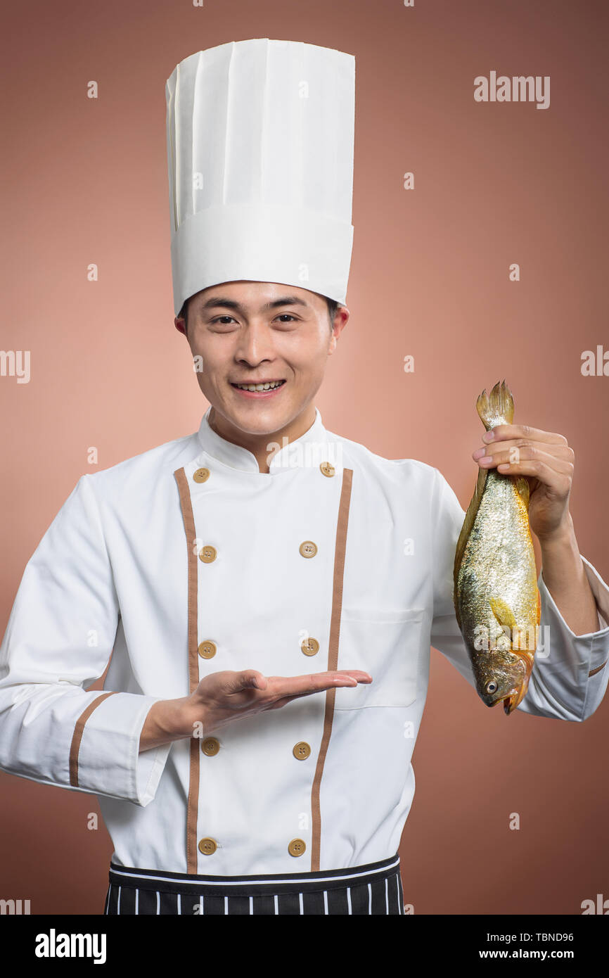 Chef cooking delicious dishes Stock Photo - Alamy