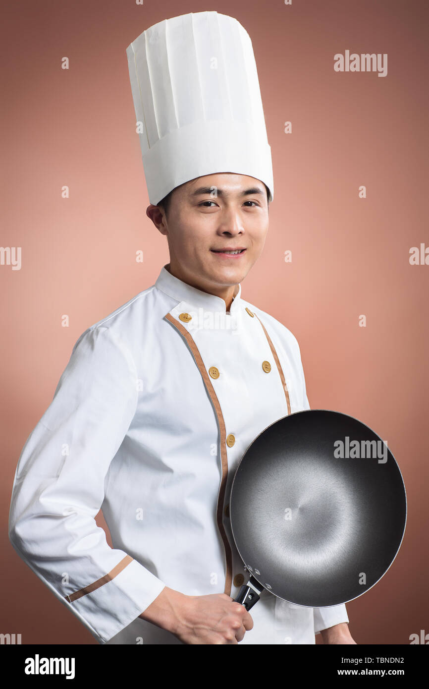 Chef cooking delicious dishes Stock Photo - Alamy