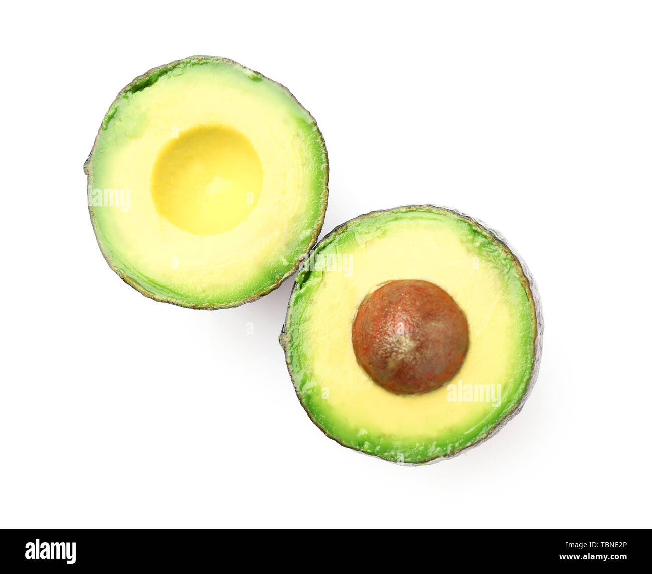 Fresh cut avocado on white background Stock Photo - Alamy