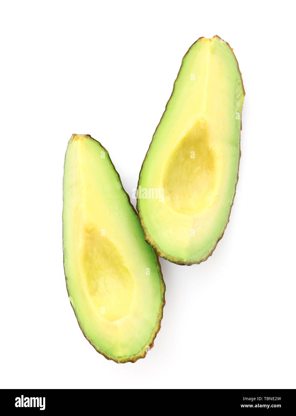 Fresh cut avocado on white background Stock Photo - Alamy