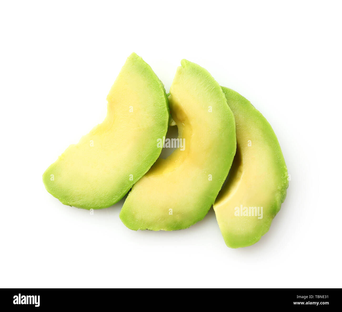 Fresh cut avocado on white background Stock Photo - Alamy