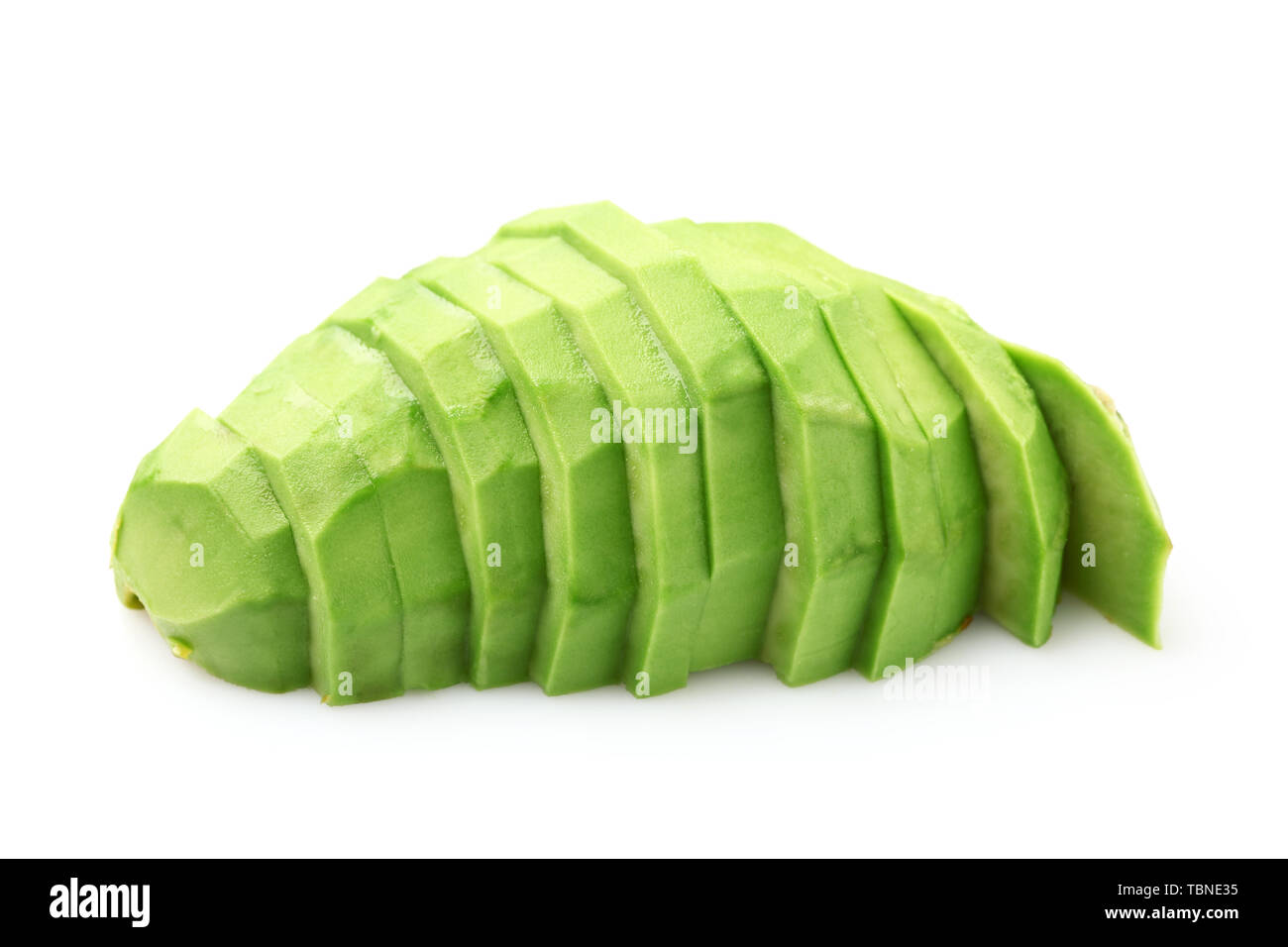 Fresh cut avocado on white background Stock Photo - Alamy