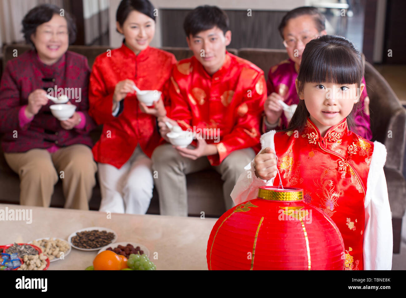 The whole family spent the Lantern Festival together Stock Photo - Alamy